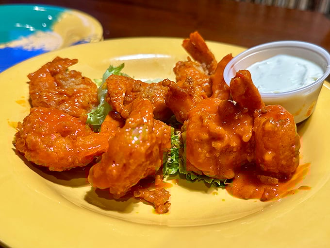 Buffalo shrimp that glow like tiny orange beacons of deliciousness. These saucy little flavor bombs prove that buffalo sauce isn't just for chicken wings anymore.