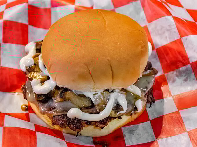 This isn't just a burger—it's edible architecture where caramelized onions and melty cheese create the perfect savory symphony.