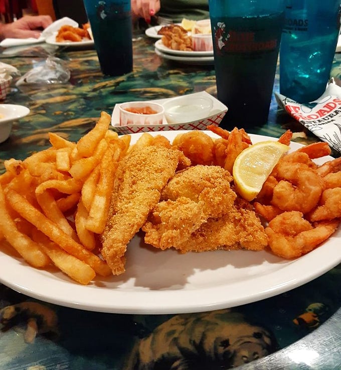 Golden-fried perfection meets French fry heaven. This platter doesn't just satisfy hunger – it creates lifelong cravings and fond memories.