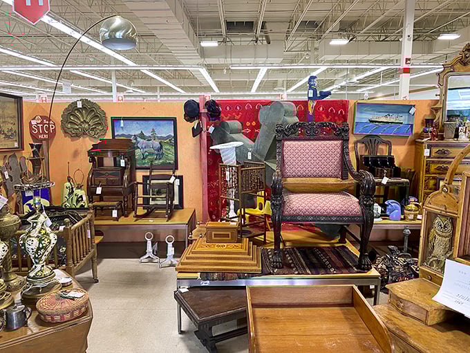This booth is what happens when Victorian elegance meets mid-century cool—that pink chair has definitely seen some fascinating conversations in its day.
