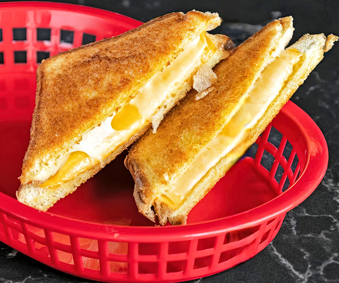The humble grilled cheese—proof that sometimes the simplest pleasures deliver the most satisfaction. Crispy outside, melty inside, perfect always.
