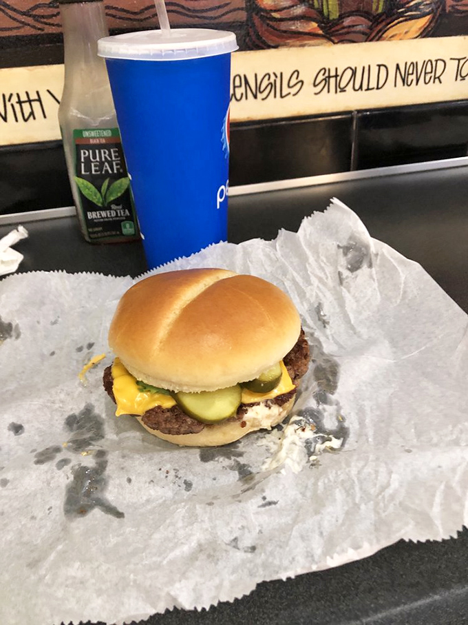Behold the star of our story—a deceptively simple cheeseburger that somehow manages to outshine everything else on Mentor's food scene.