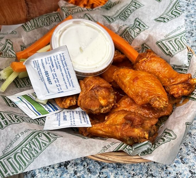 These wings aren't just Buffalo-style, they're a masterclass in crispiness and sauce distribution. The celery and blue cheese aren't sidekicks – they're essential supporting actors.