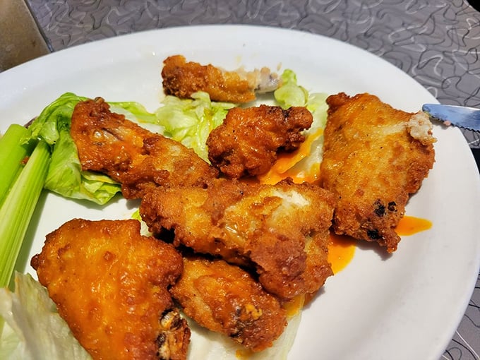 Buffalo wings that don't need a sporting event as an excuse – crispy, saucy perfection that makes any day feel like game day.