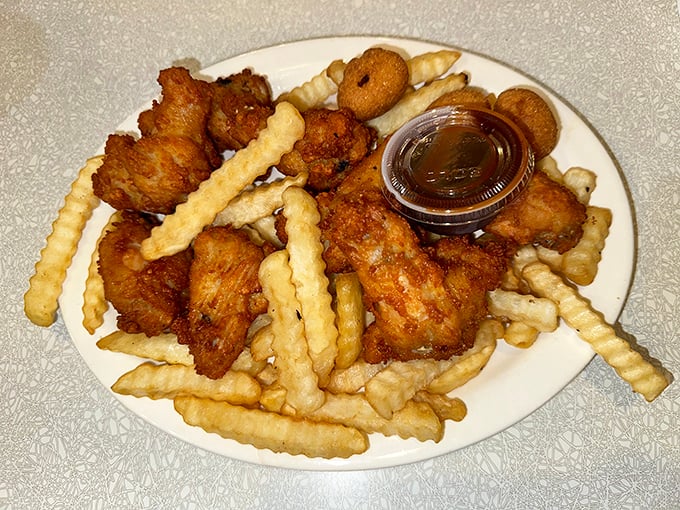 These wings arrived dressed for success – golden, glistening, and ready to make your taste buds sing hallelujah.