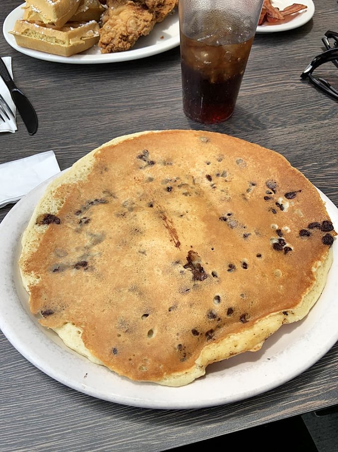This chocolate chip pancake isn't just big—it's Pennsylvania-sized. One flapjack to rule them all, and in breakfast bind them.