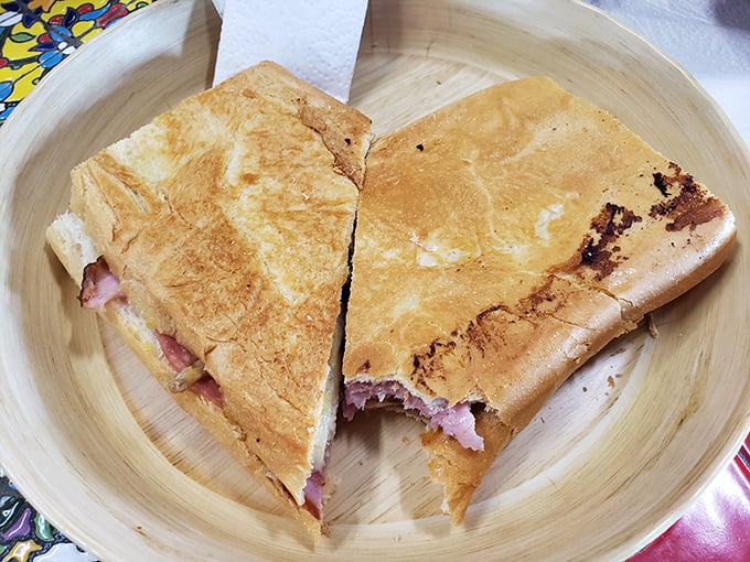 The Cuban sandwich—Tampa's culinary handshake—pressed to golden perfection with layers that tell the city's immigrant story one bite at a time.