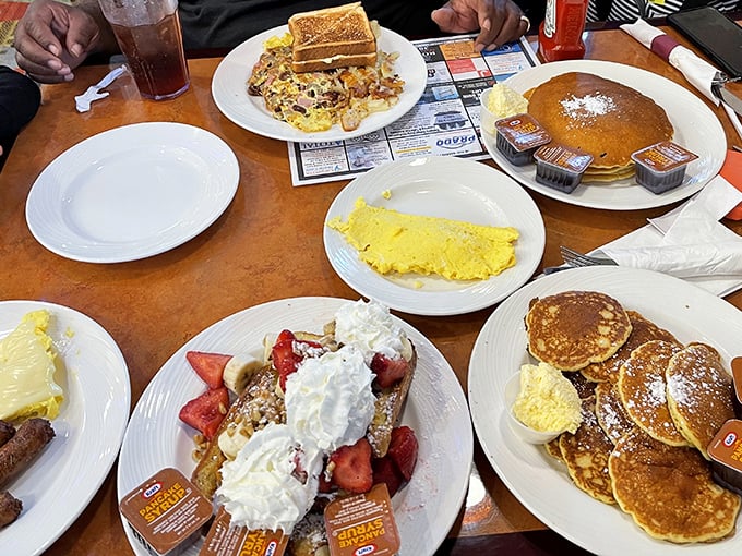 Breakfast spread that would make your grandmother proud and your doctor concerned. The strawberry-topped waffle is practically winking at you.