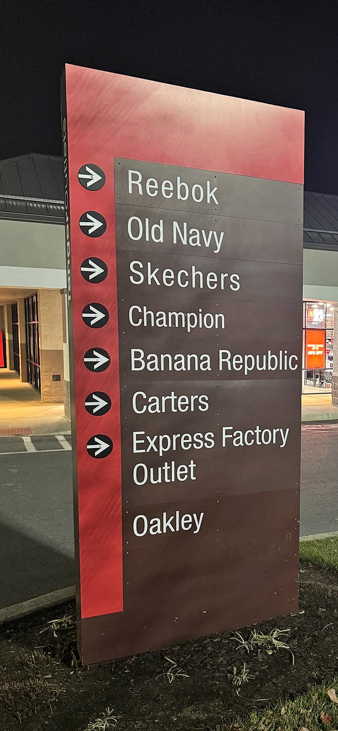 This directional sign isn't just information—it's a choose-your-own-adventure guide to retail therapy. Which arrow calls to your wallet first?