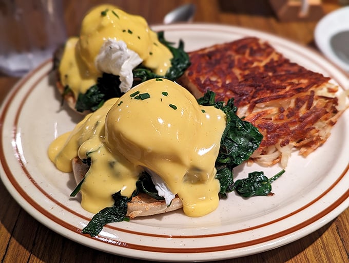 Eggs Benedict that's dressed better than most people at brunch – that hollandaise sauce drapes over English muffins like a silk robe on a Hollywood starlet.
