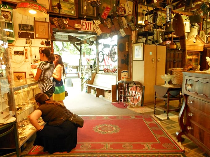 Antiques stacked to the rafters create narrow pathways of discovery, where one person's discarded past becomes another's cherished conversation piece.