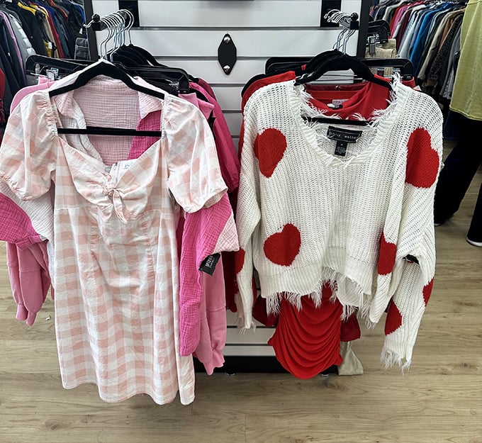 Heart-adorned sweaters and breezy blouses hanging side by side—like finding the perfect rom-com for your wardrobe.