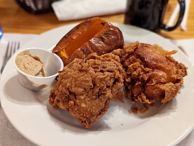 The holy grail of fried chicken – golden, crunchy exterior giving way to juicy meat that makes you wonder why you'd eat chicken any other way.