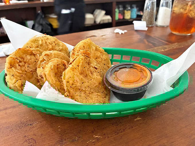 These aren't just fried green tomatoes; they're edible Southern history. Crispy, tangy discs of joy served in an unpretentious basket—as they should be.