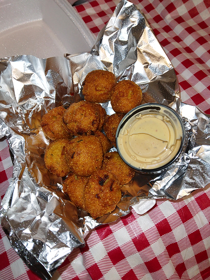 These golden-fried mushrooms aren't just appetizers—they're little umami bombs waiting to explode with earthy goodness. The dipping sauce is merely a bonus.
