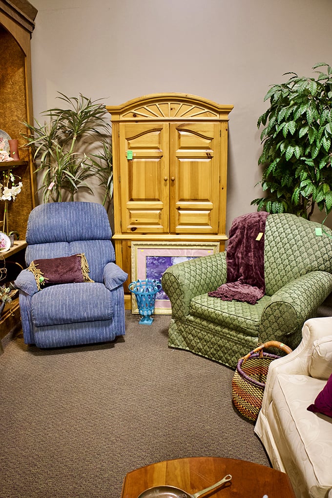Living room vignettes that whisper "sit a spell," featuring armchairs that have already been broken in by someone else's Sunday afternoon naps. 