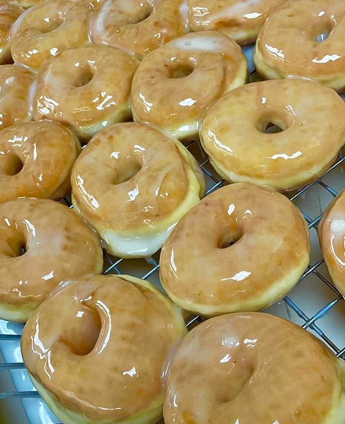 Classic glazed donuts that prove simplicity is the ultimate sophistication—each one a golden ring of breakfast joy that puts your healthy cereal to shame.