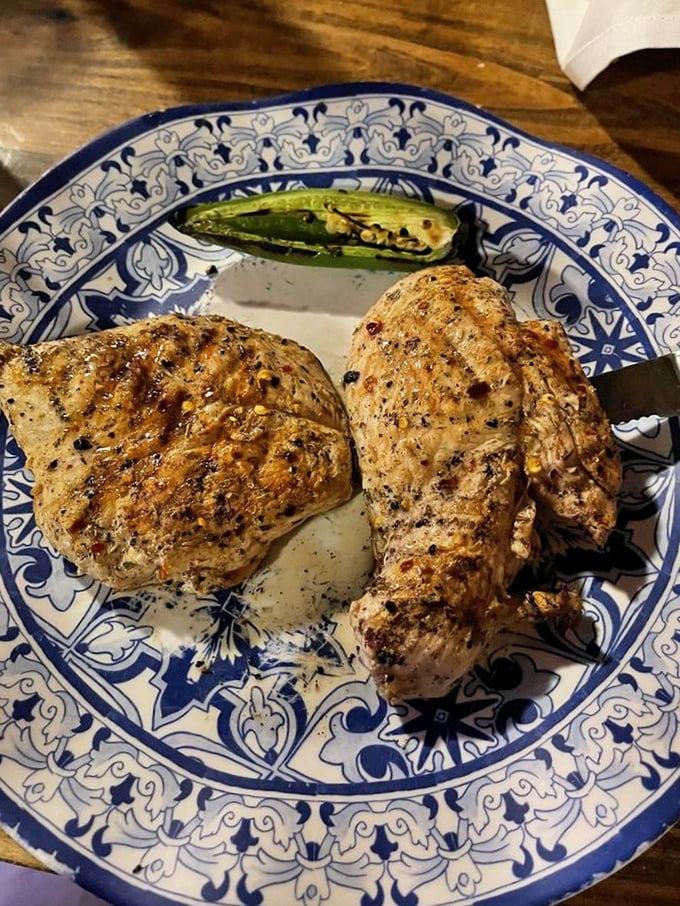 Even chicken gets the royal treatment here. Those char marks aren't accidents – they're flavor signatures from masters of the flame.