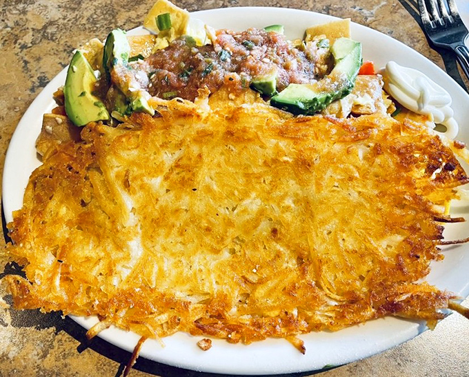 These hash browns achieve the impossible physics of being simultaneously crispy-edged and tender-centered—a potato paradox worth solving.