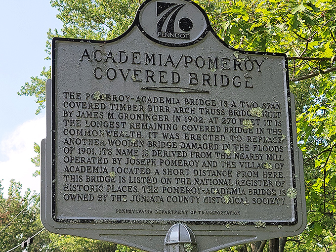 History buffs rejoice! This marker confirms you're standing before Pennsylvania's longest remaining covered bridge—a whopping 278 feet.