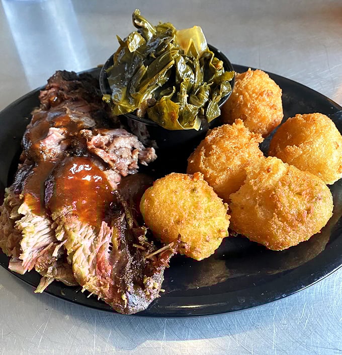 Those golden-brown hushpuppies are the unsung heroes of barbecue sides. Crispy exterior, fluffy interior – the perfect sauce-sopping companions. 