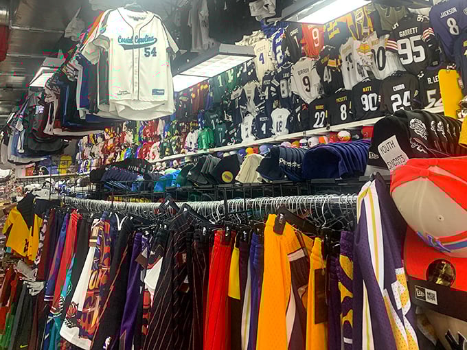 Sports jersey heaven where fans can represent their teams without representing their entire paycheck. A rainbow of athletic allegiances hanging in perfect harmony.
