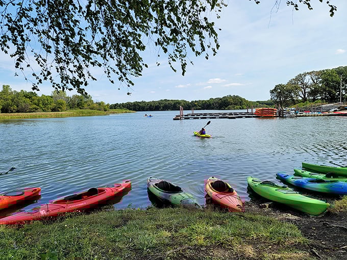 Kayak rental heaven—where the hardest decision you'll make all day is choosing between the red one that matches your shoes or the green one that doesn't.