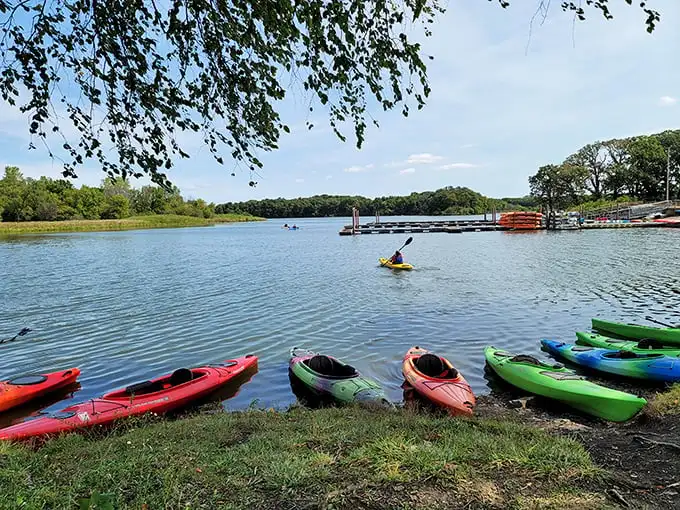 Kayak rental heaven—where the hardest decision you'll make all day is choosing between the red one that matches your shoes or the green one that doesn't.
