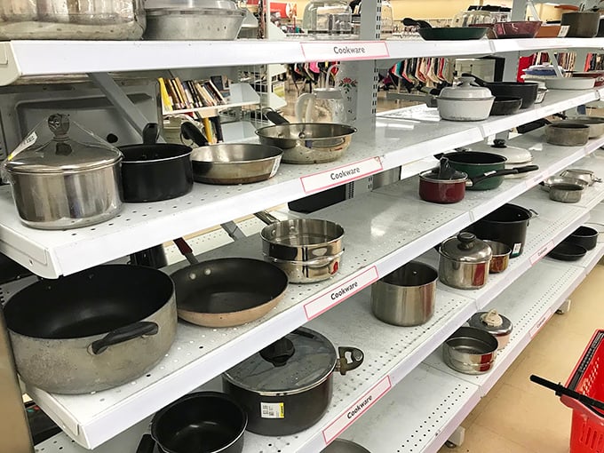 Pot-ential overload! This cookware collection could outfit a small army of chefs. Gordon Ramsay would have a field day in this culinary playground.