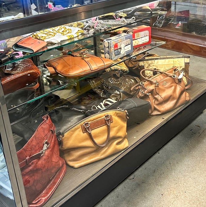 Handbag heaven behind glass—where vintage Coach meets contemporary classics. Each one secretly hoping you'll take it to brunch this weekend.