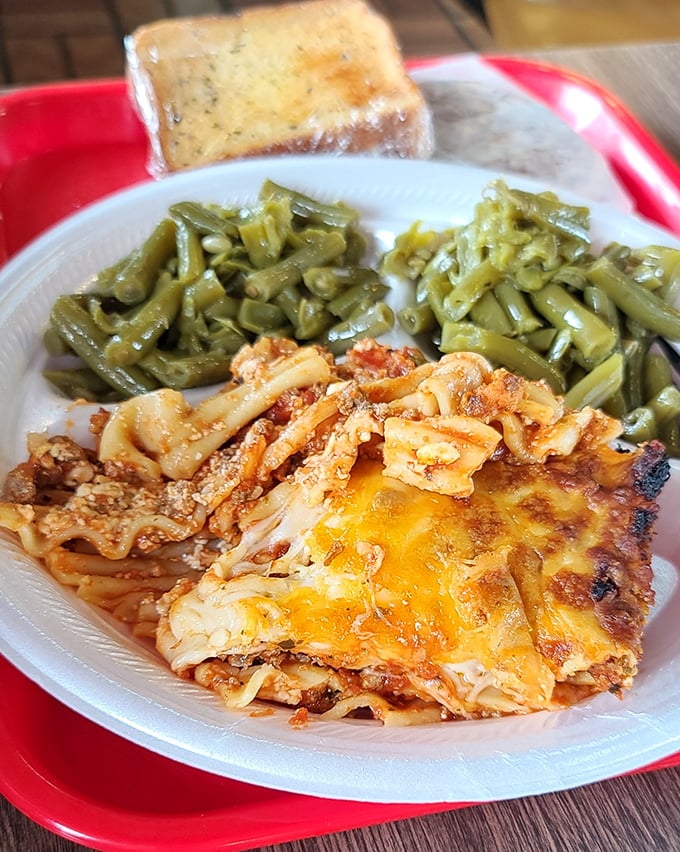 The lasagna that launched a thousand road trips—layers of pasta, seasoned meat, and melted cheese that would make any Italian grandmother nod in approval.