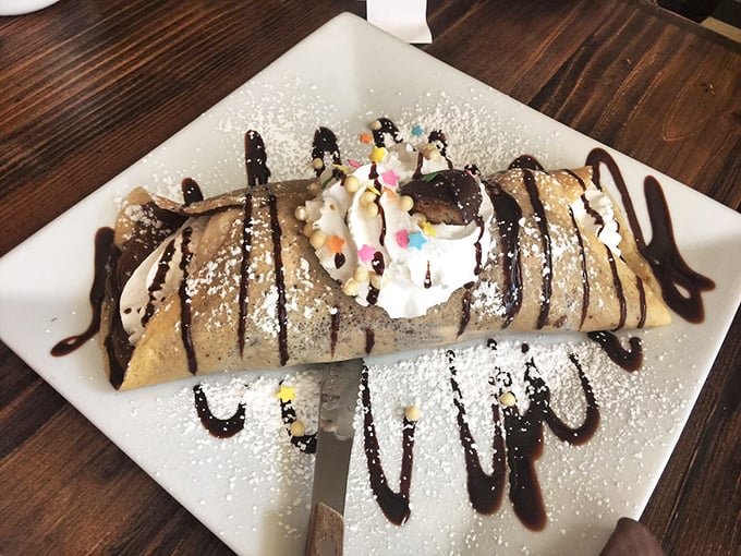 Chocolate hazelnut heaven drizzled with artistic abandon. This dessert doesn't just satisfy cravings—it creates entirely new ones.