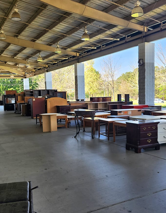 Desks and tables displayed under open skies—the only outdoor furniture showroom where rain checks are literally necessary.