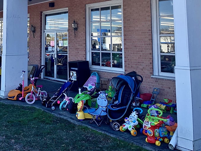 Children's paradise outside the front door. Yesterday's beloved toys waiting patiently for their next adventure with new tiny humans.