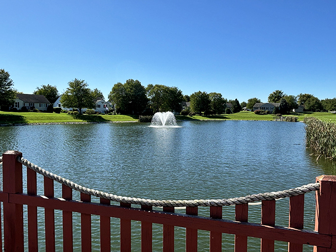The community pond—nature's mood stabilizer. That fountain isn't just pretty; it's drowning out any thoughts you might have about mowing your own lawn ever again.