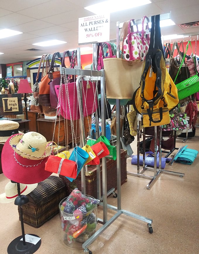 The accessories section—where handbags that once cost hundreds now dangle with colorful potential for just a few dollars.