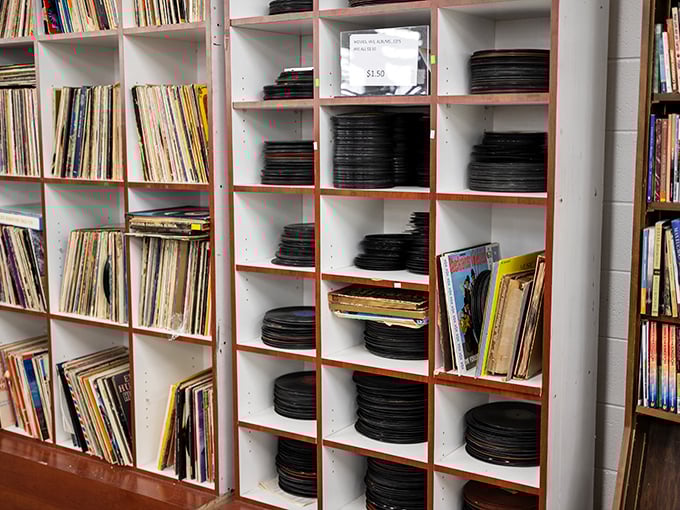 Vinyl paradise! Each black disc represents someone's abandoned soundtrack, ready to spin new memories in your living room for pocket change.
