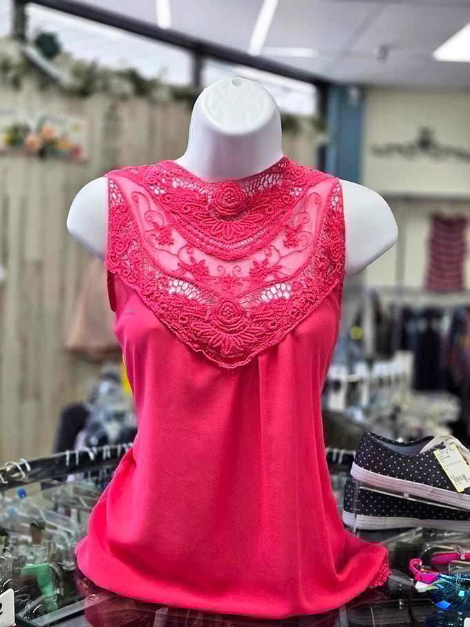 Lace details that whisper "I paid full price" while your wallet knows better. This coral top proves consignment shopping isn't about compromise.