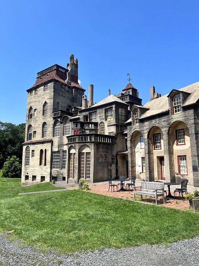 Sun-drenched and serene, this exterior courtyard offers a moment of reflection amid the castle's architectural exuberance.