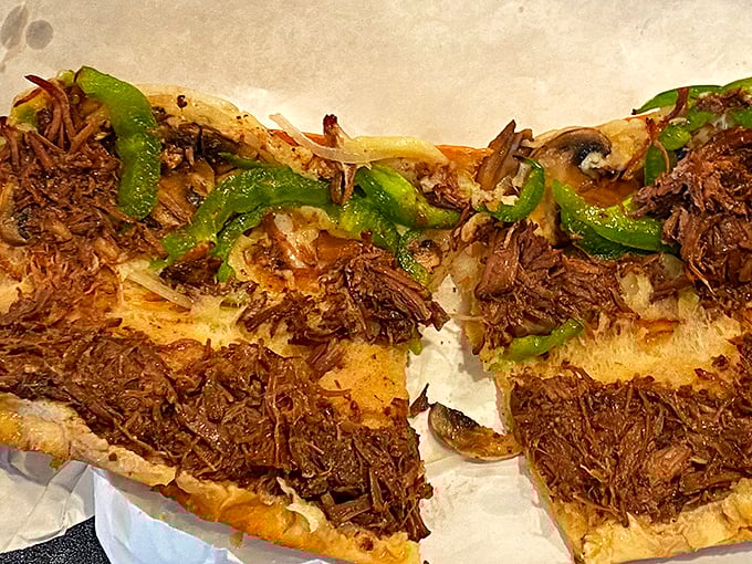 Behold the roast beef sandwich in its natural habitat – tender, shredded beef nestled in that perfect bread. This is what sandwich dreams are made of.