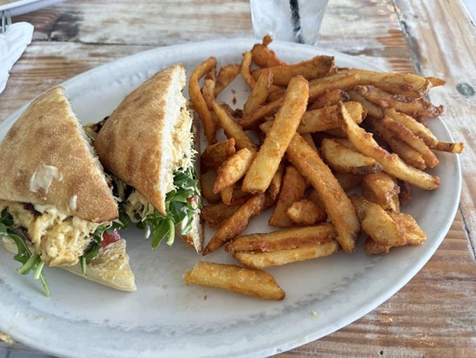 The sandwich that launched a thousand lunch cravings. Those golden fries aren't just a side dish – they're the supporting actors who steal the show.
