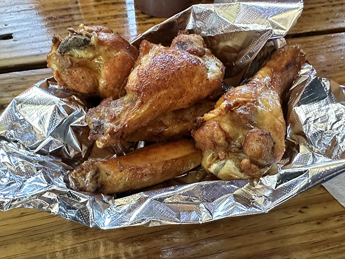 These wings didn't just meet smoke—they had a deep, meaningful relationship with it. Crispy skin, tender meat, and a color that screams "I know what I'm doing."