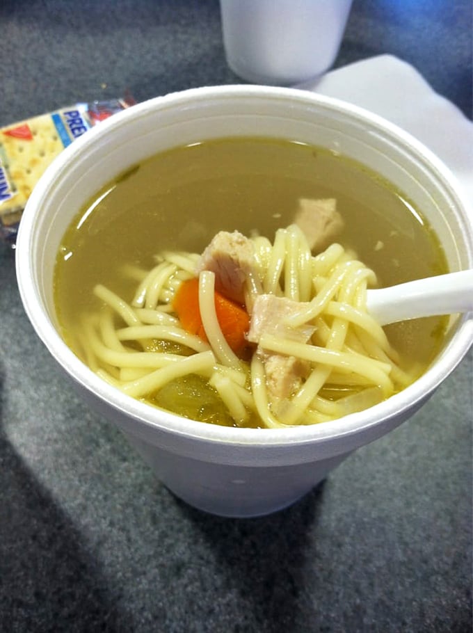 Jewish penicillin with noodles that dance in golden broth – this isn't just soup, it's a warm hug in a to-go container.