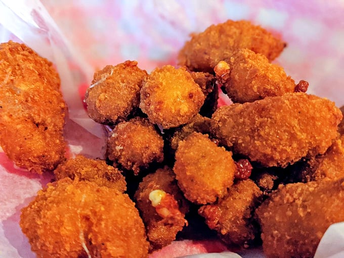 Little nuggets of joy that crunch, then melt. These golden-fried cheese curds deliver that perfect textural contradiction—crispy outside, gooey inside—that makes snacking an art form.