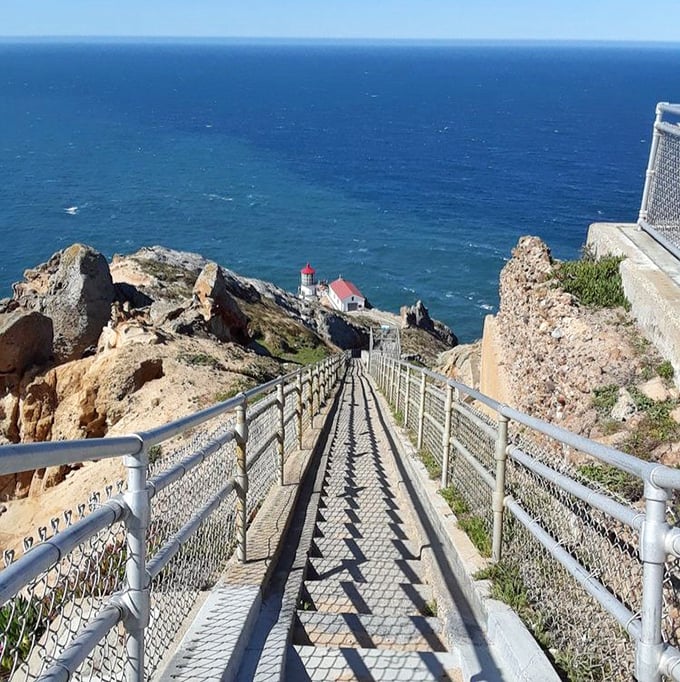The stairway to heaven? Not quite—it's the stairway back up from the lighthouse, where every step reminds you how much you love your couch.