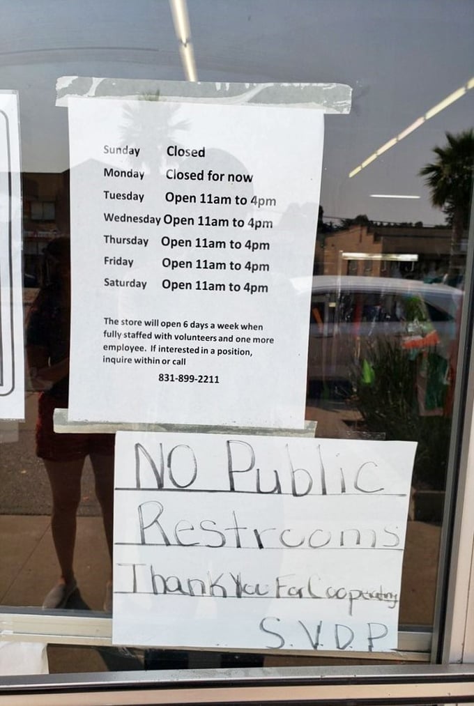 The store hours sign reveals the secret to successful thrifting—Tuesday through Saturday, 11am to 4pm. Mark your calendars, treasure hunters!