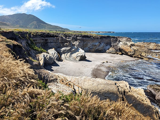 This rocky amphitheater hosts daily performances by waves that never need rehearsal.
