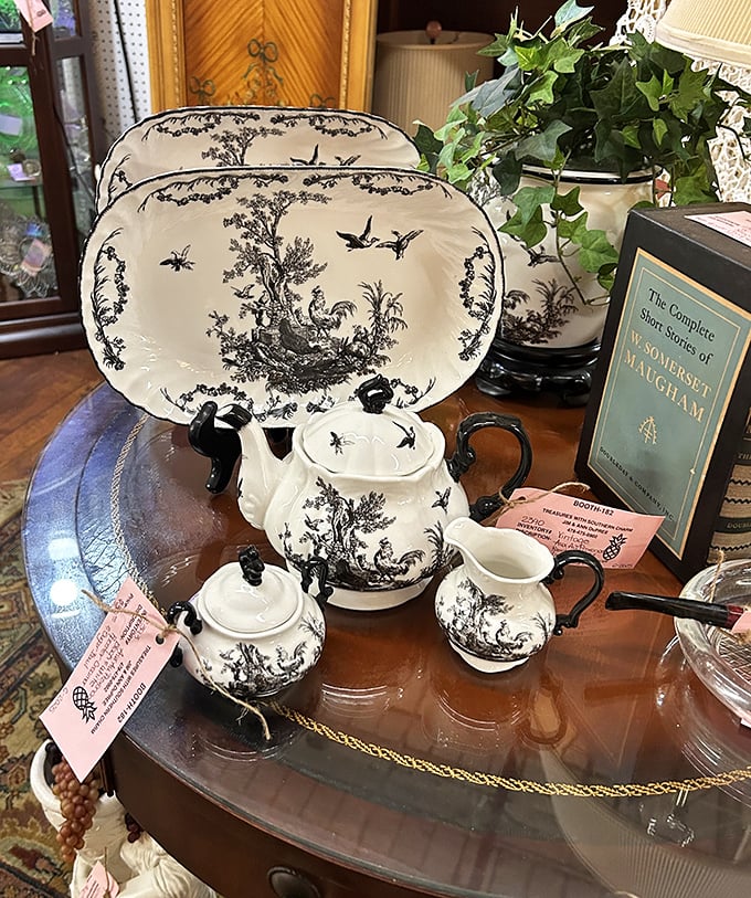 This elegant black and white tea set isn't just dishware—it's a portal to an era when people actually sat down for afternoon tea instead of slurping from travel mugs.