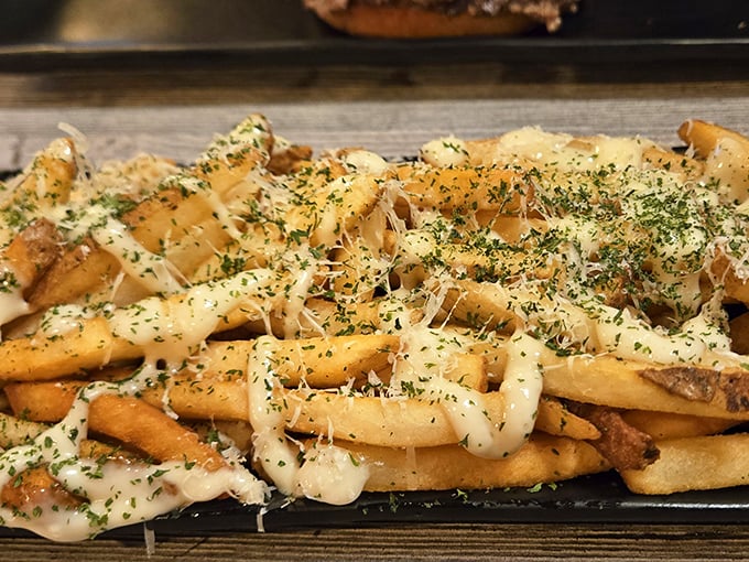 These aren't just fries – they're potato masterpieces, elevated with herbs, cheese, and a drizzle that makes ketchup seem obsolete.