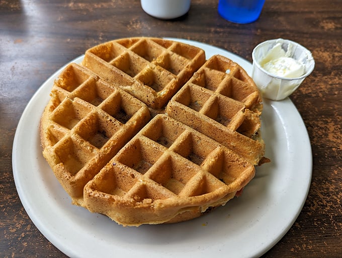 This golden waffle doesn't need Instagram filters—just a pat of butter and perhaps a silent moment of gratitude.
